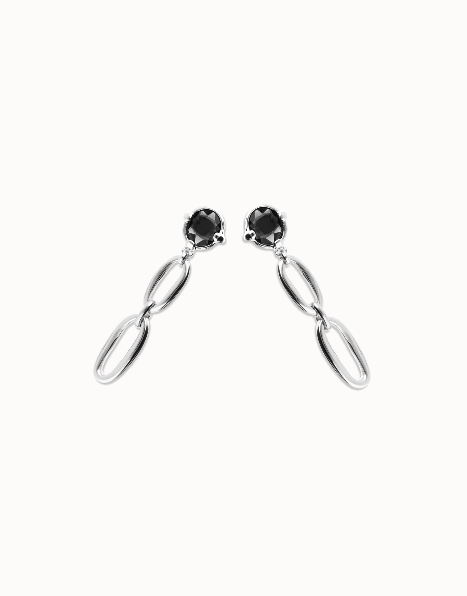 Pendientes largos bañados en plata con cristal facetado negro y ...