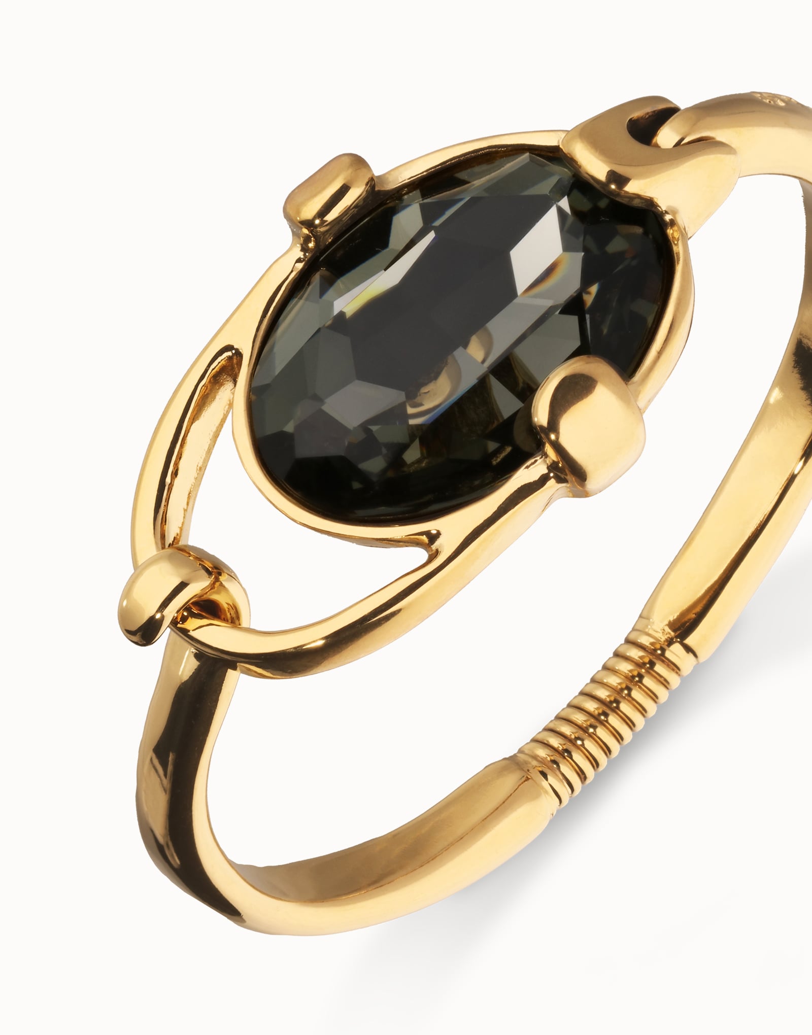 Pulsera rígida bañada en oro 18k con cristal facetado ovalado gris