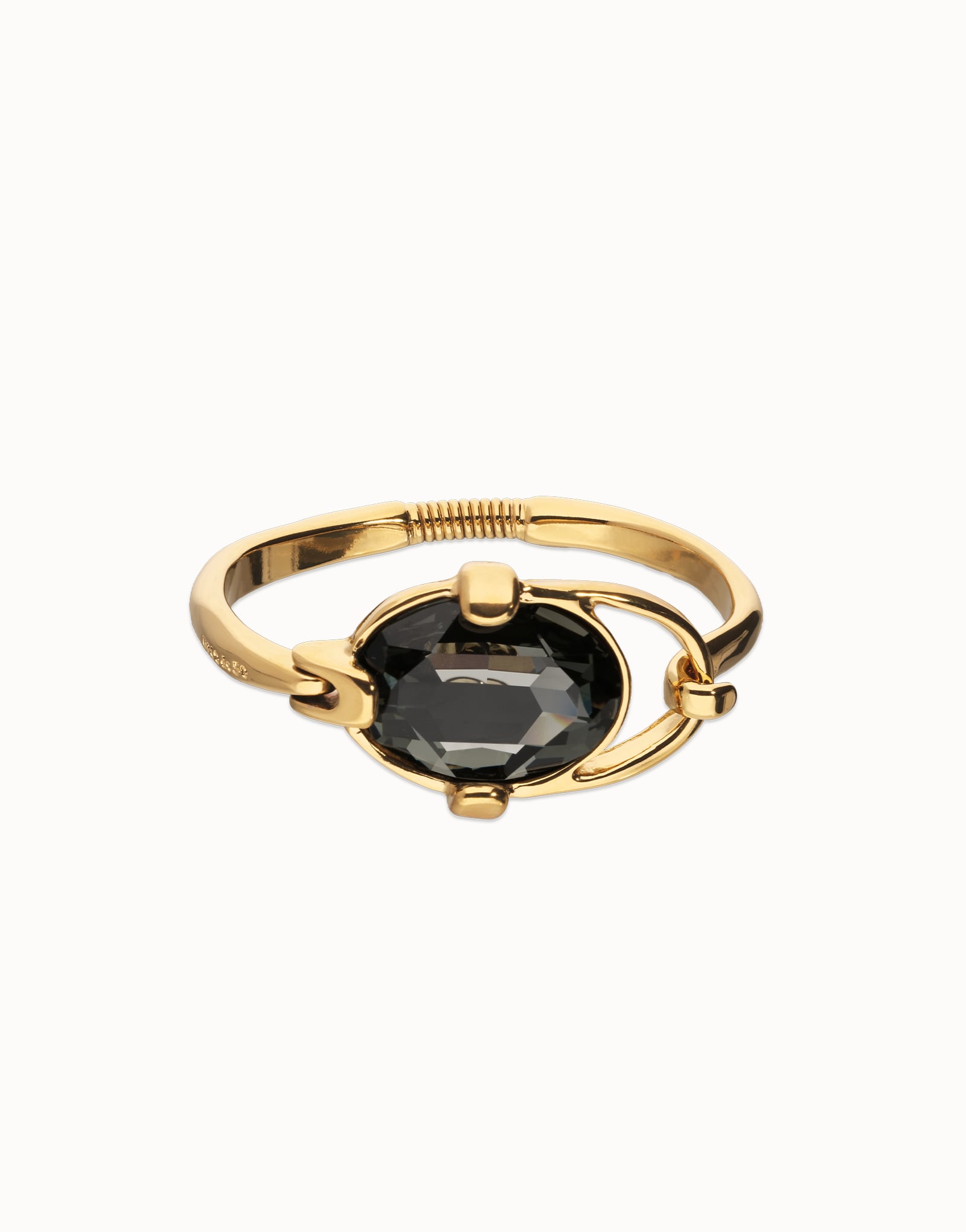 Pulsera rígida bañada en oro 18k con cristal facetado ovalado gris ...