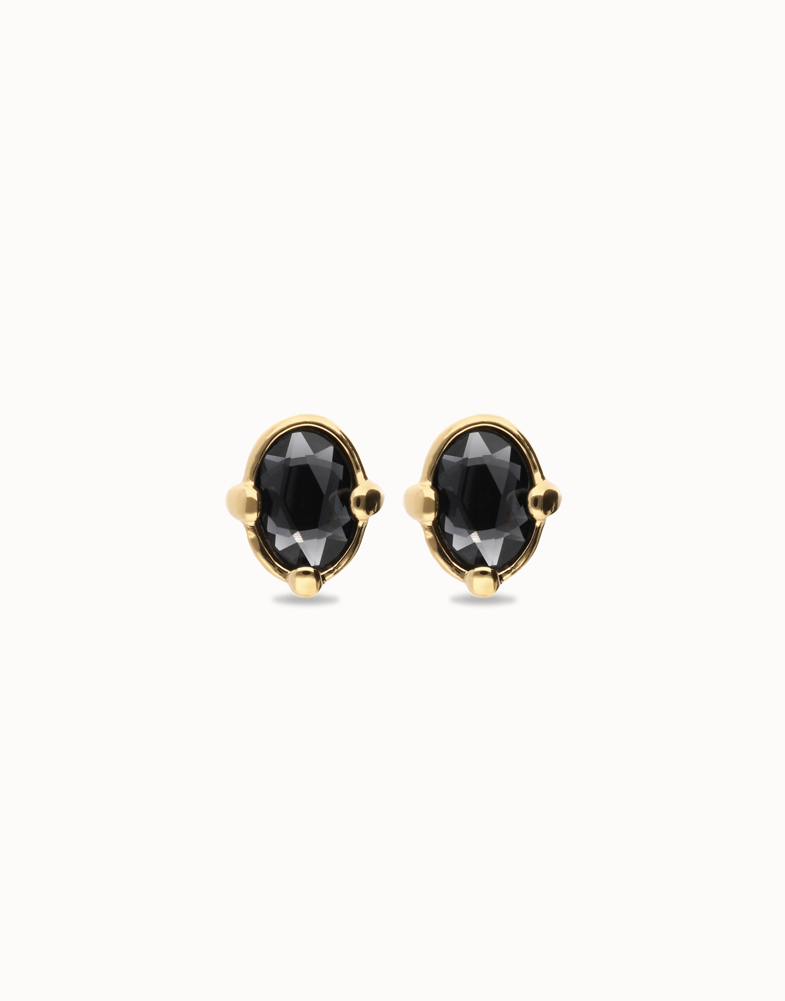Pendientes bañados en oro 18k con cristal facetado ovalado negro ...